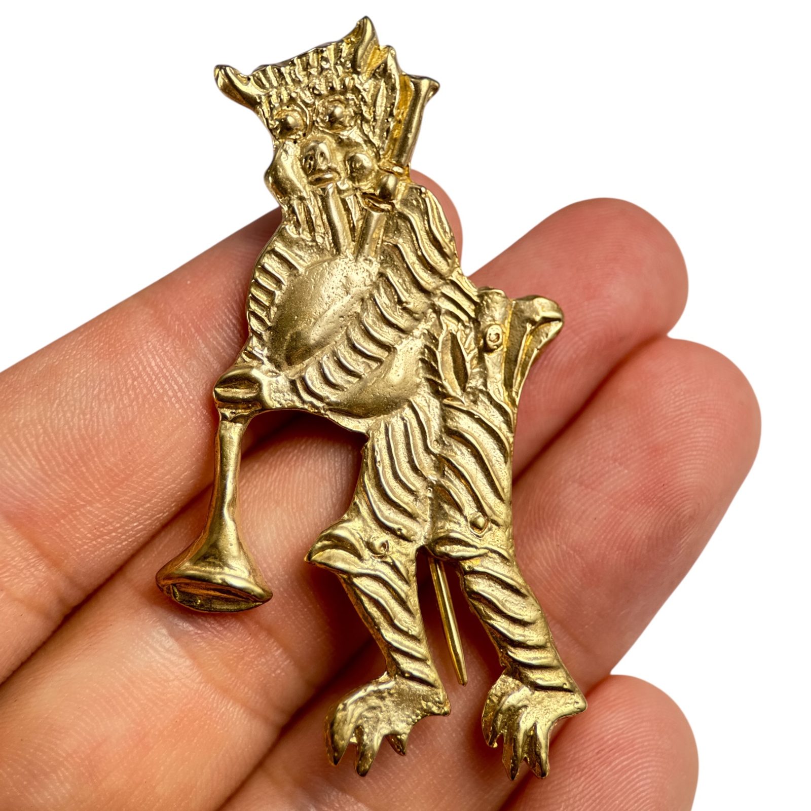 Devil with bagpipes, medieval pilgrim badge Wulflund