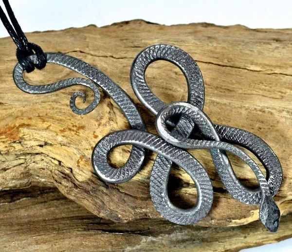 KNOTTED SNAKE, hand forged talisman Animal pendants Zinc amulets ...